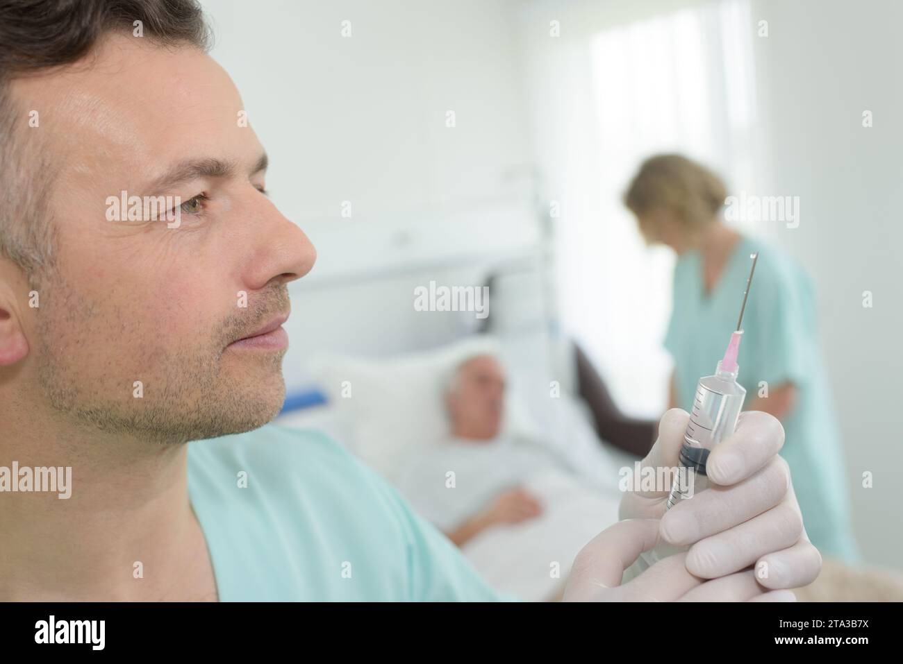 nurse preparing needle in a hospital Stock Photo - Alamy