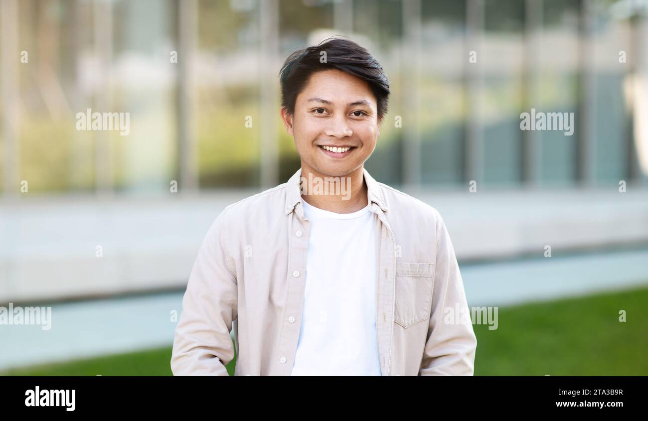 Portrait cheerful asian male hi-res stock photography and images - Alamy