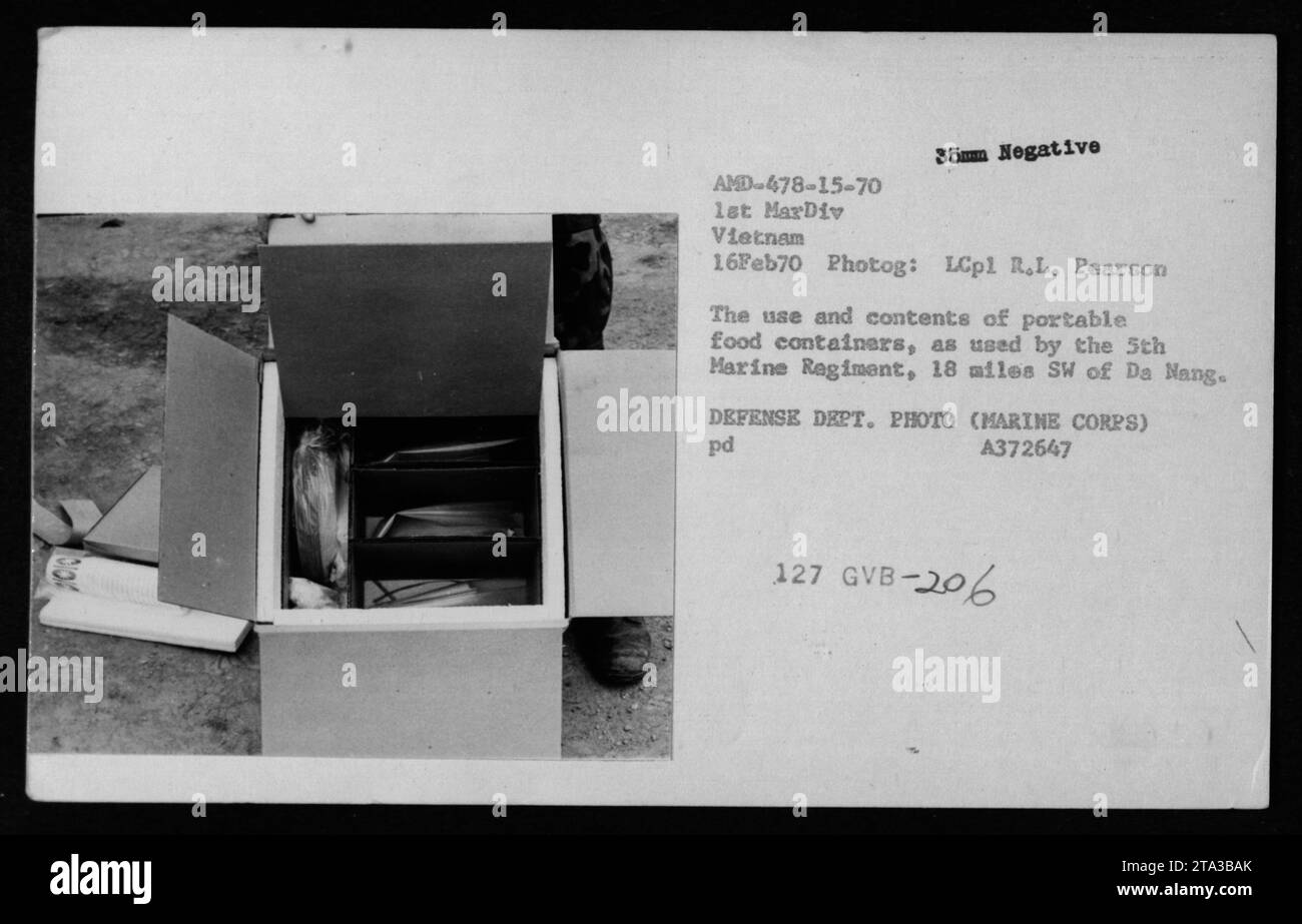 Marine Corps personnel from the 5th Marine Regiment are seen utilizing ...