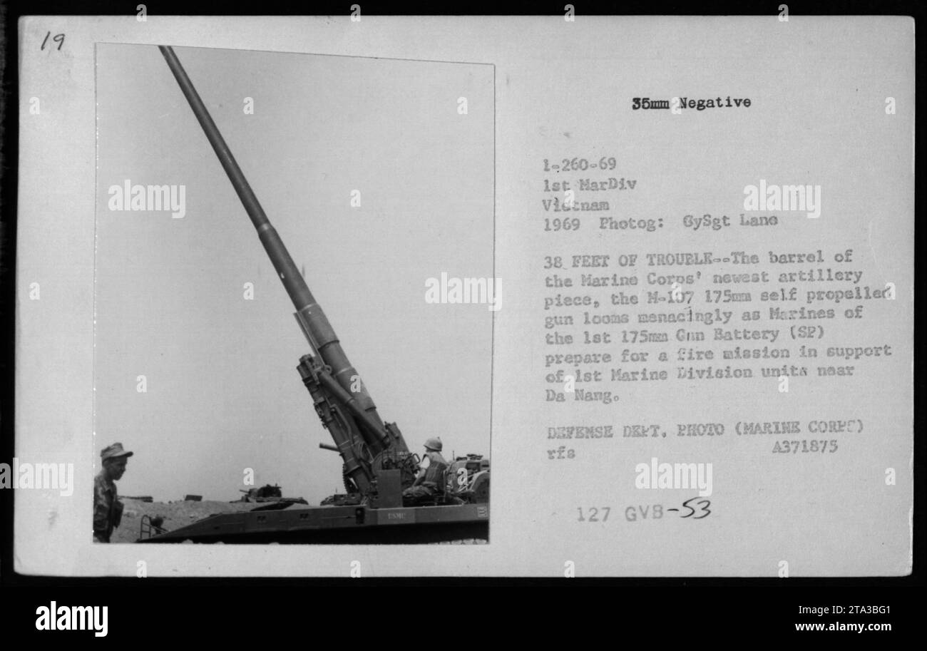 Marines from the 1st 175mm Gran Battery (SP) prepare for a fire mission ...