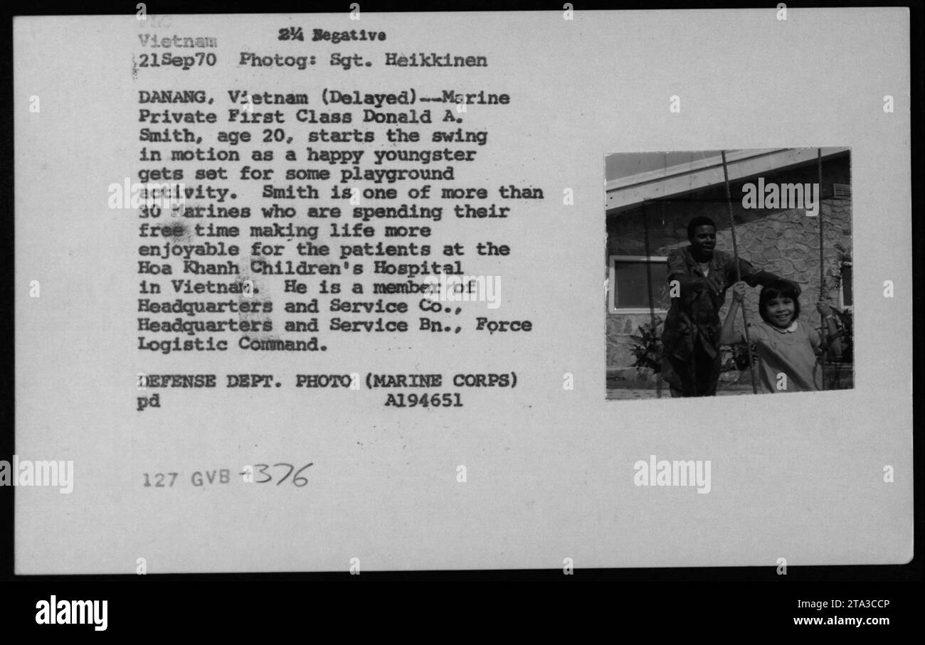 Marine Private First Class Donald A. Smith initiates a swing for a ...