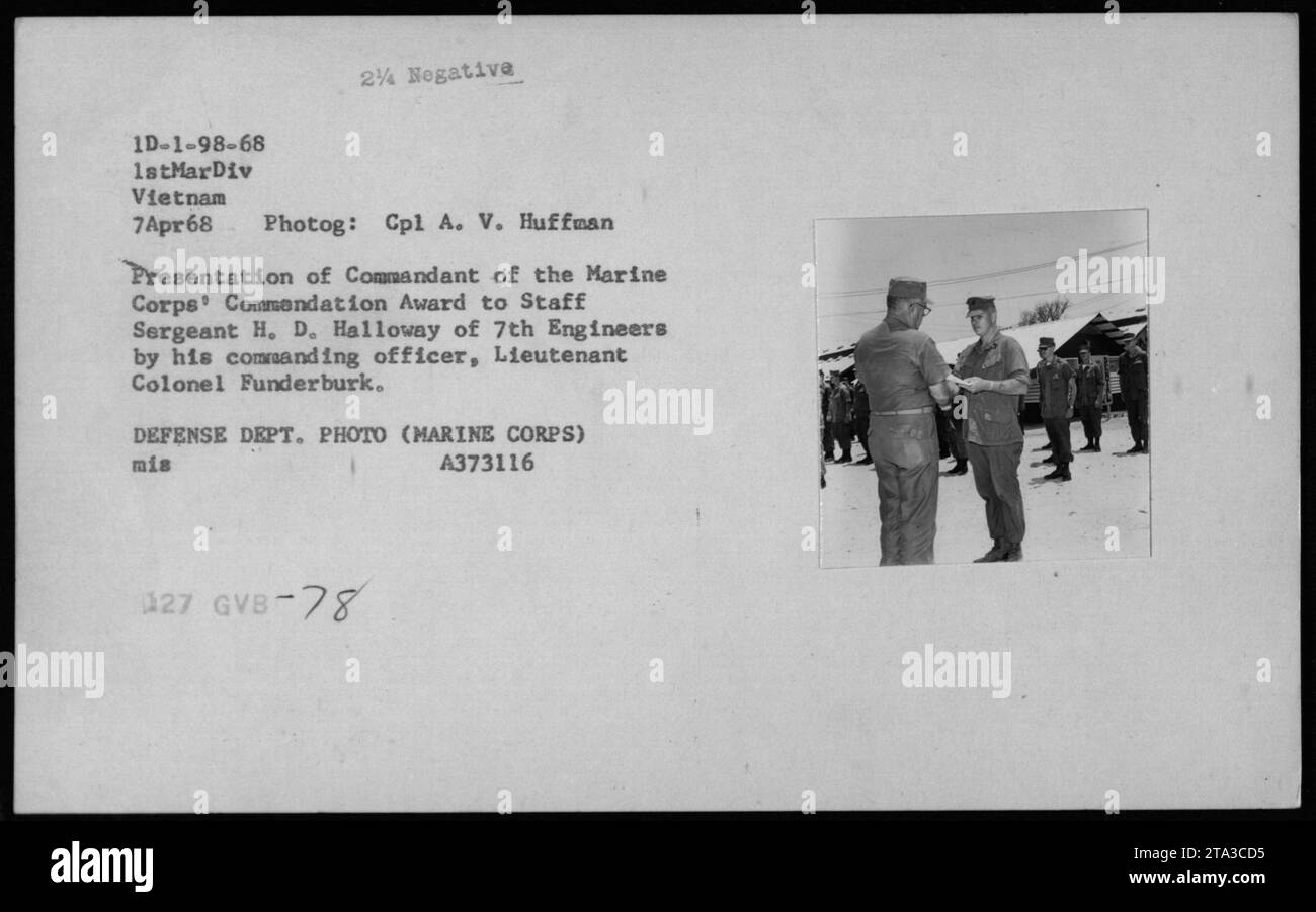 Staff Sergeant H. D. Halloway of 7th Engineers receiving the Commandant ...