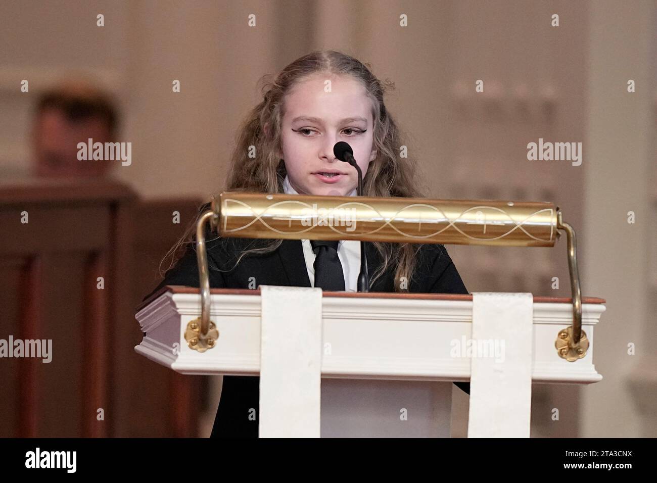 Errol Carter Kelly reads scripture at a tribute service for the former ...