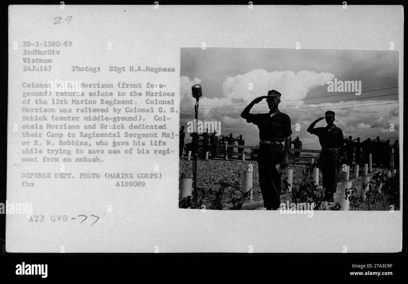 Colonel W.R. Morrison (front foreground) salutes the Marines of the ...