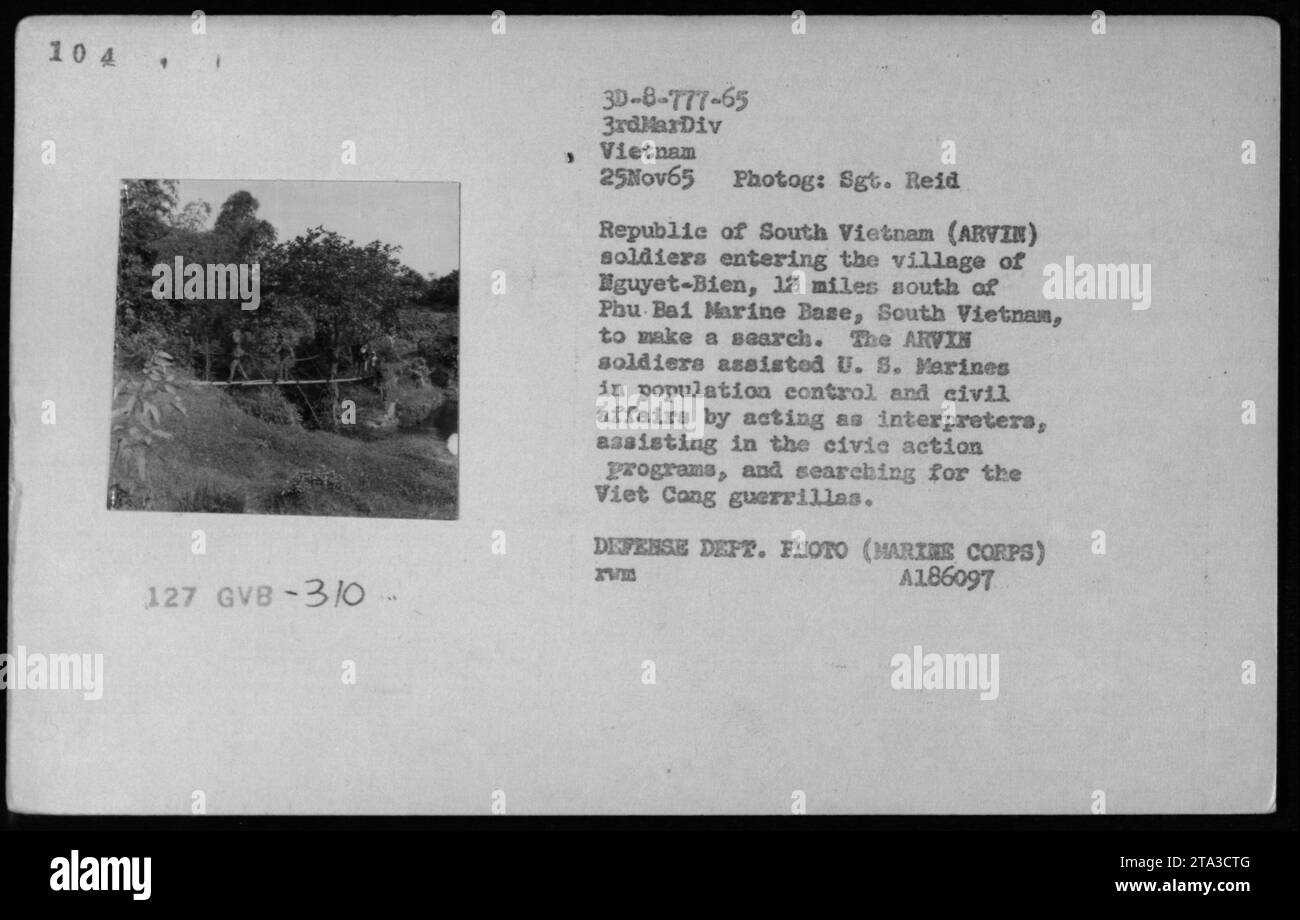 ARVN soldiers enter the village of Nguyet-Bien in South Vietnam, on ...