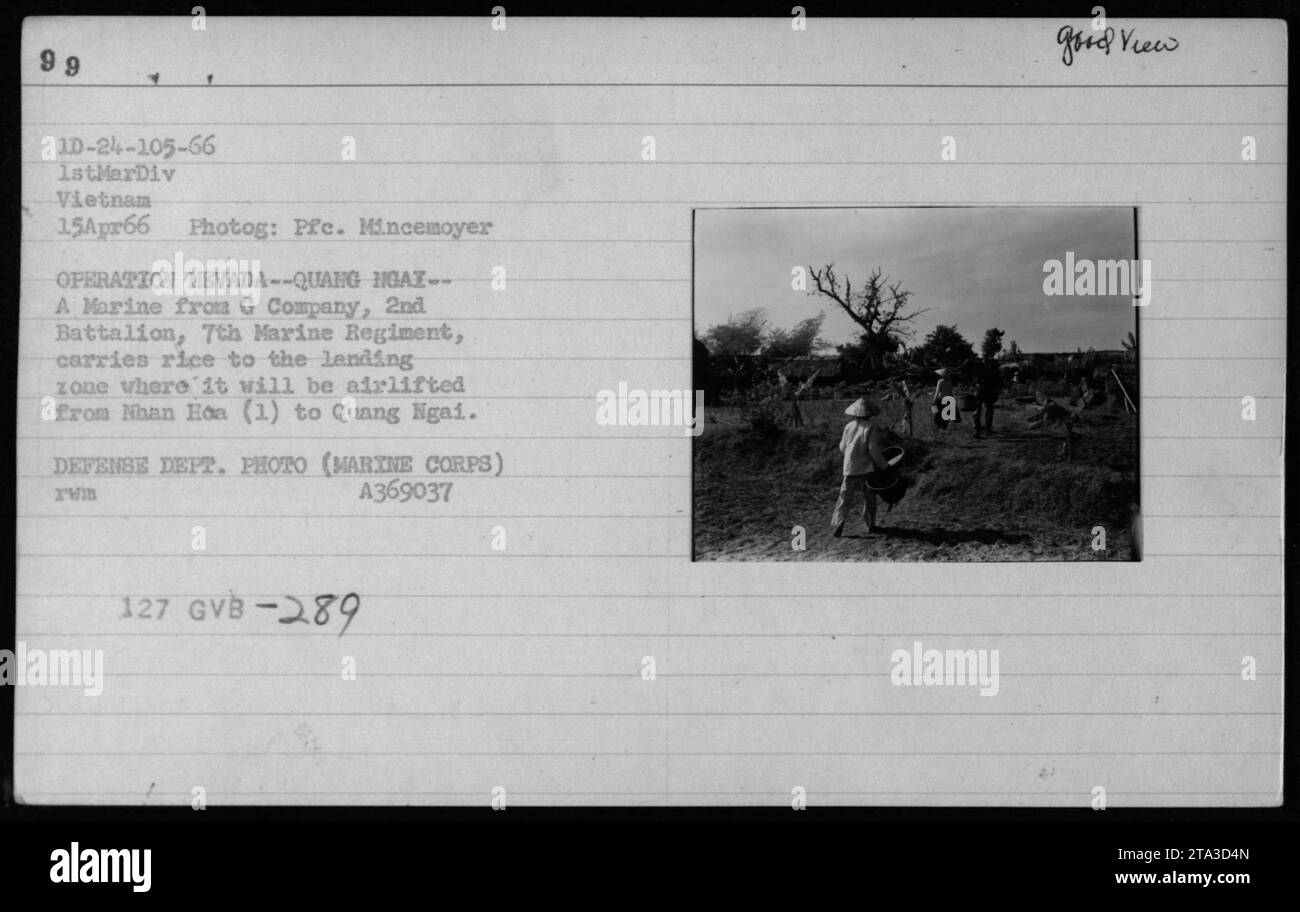 Marine from G Company, 2nd Battalion, 7th Marine Regiment, carrying ...