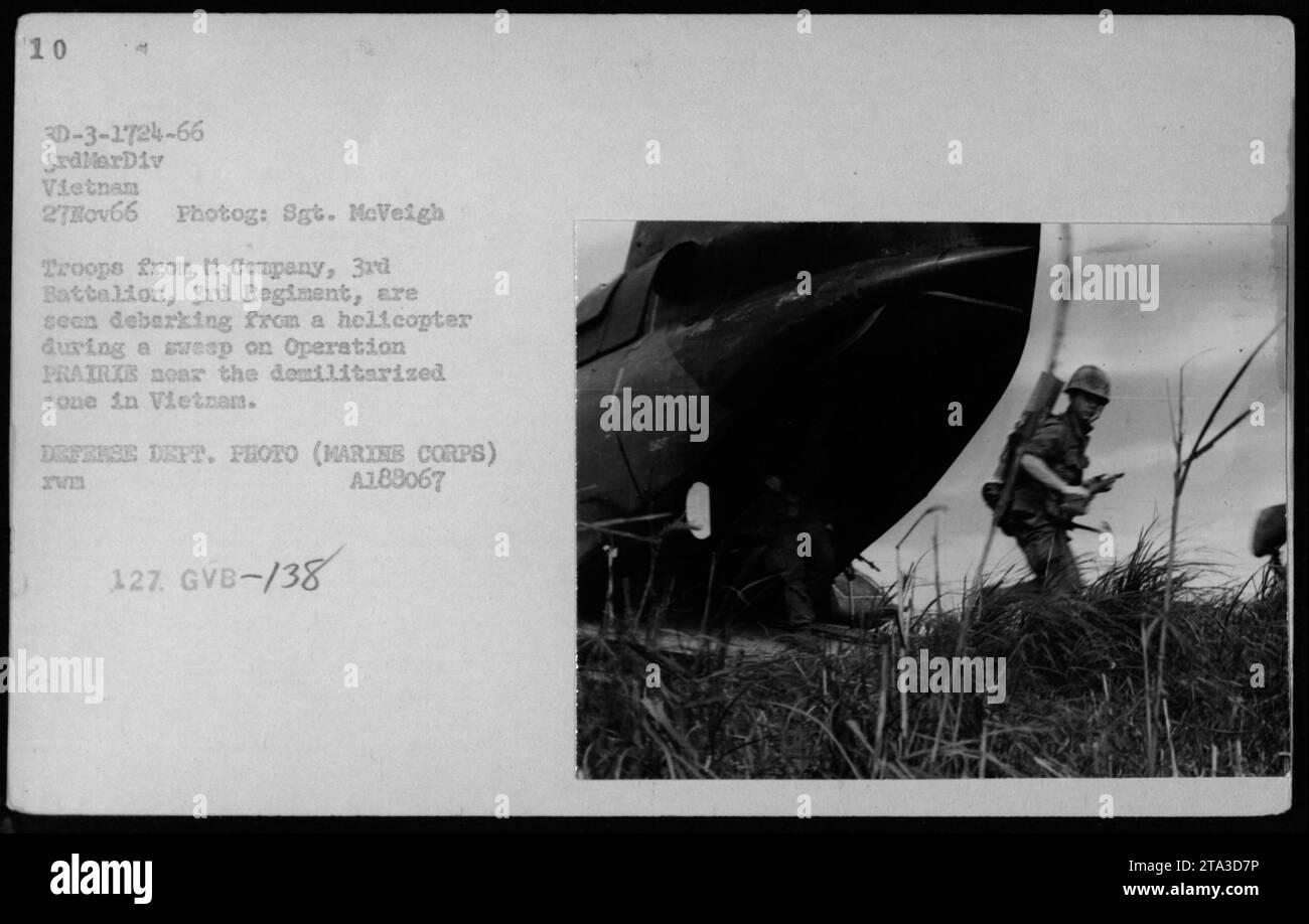 Troops from M Company, 3rd Battalion, 3rd Regiment, debark from a ...