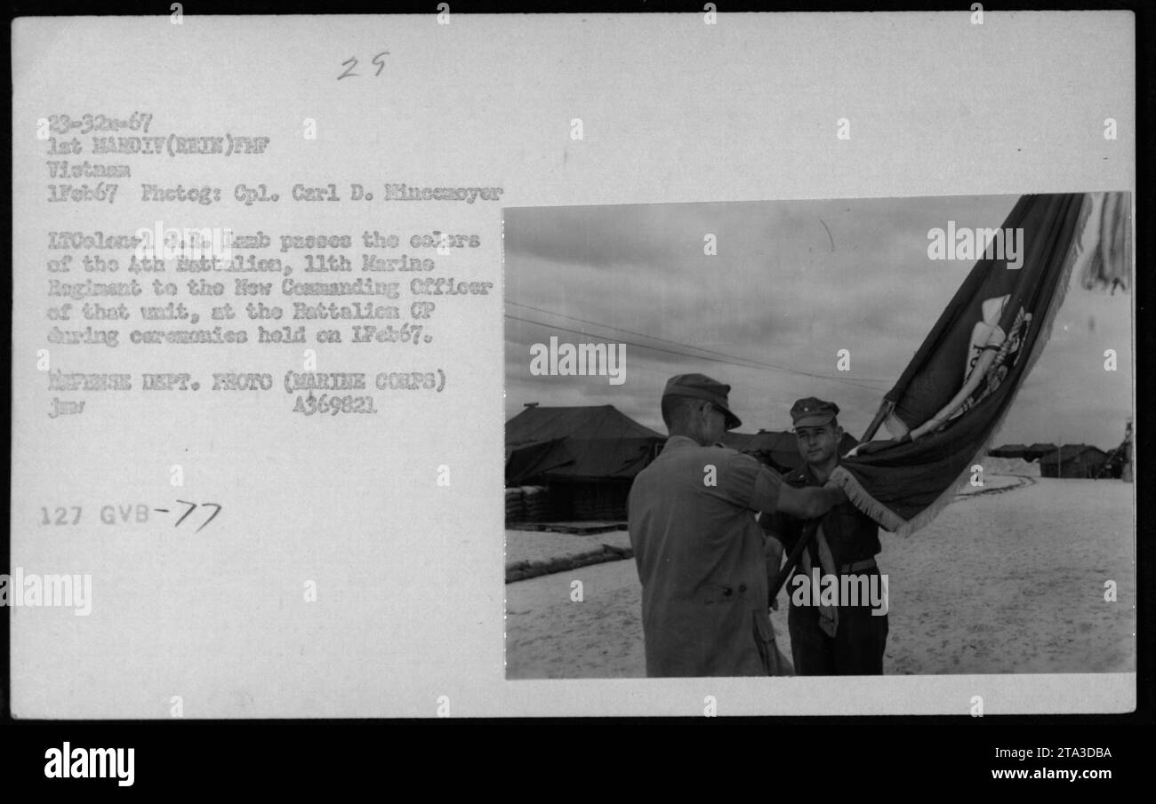 Colonel O.R. Lamb passes the colors of the 4th Battalion, 11th Marine ...