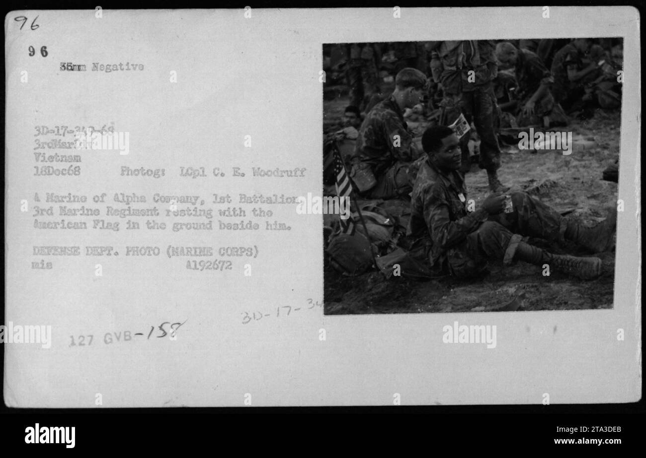 A Marine from Alpha Company, 1st Battalion, 3rd Marine Regiment rests ...