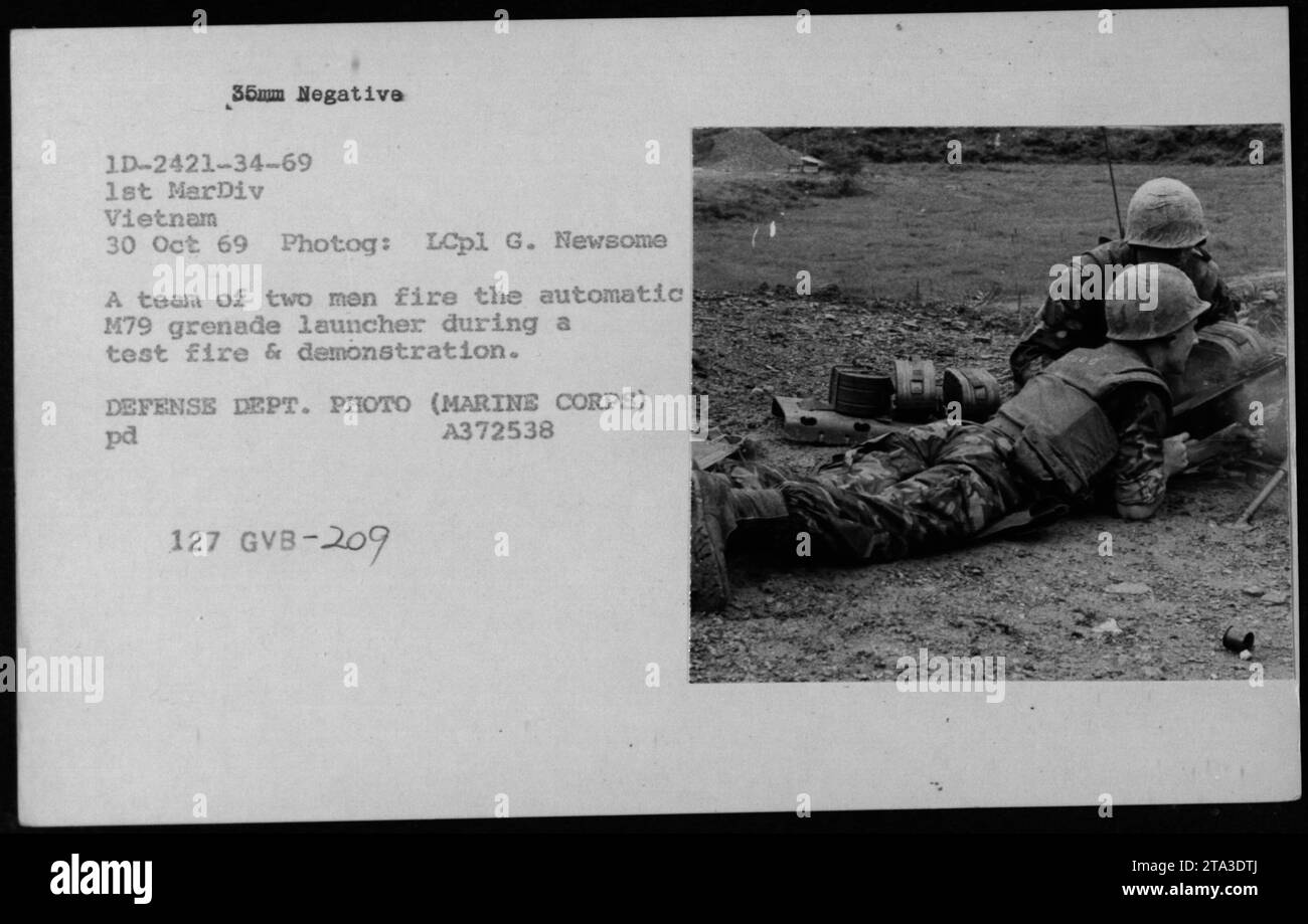 Marines demonstrate automatic M79 grenade launchers during a test fire ...