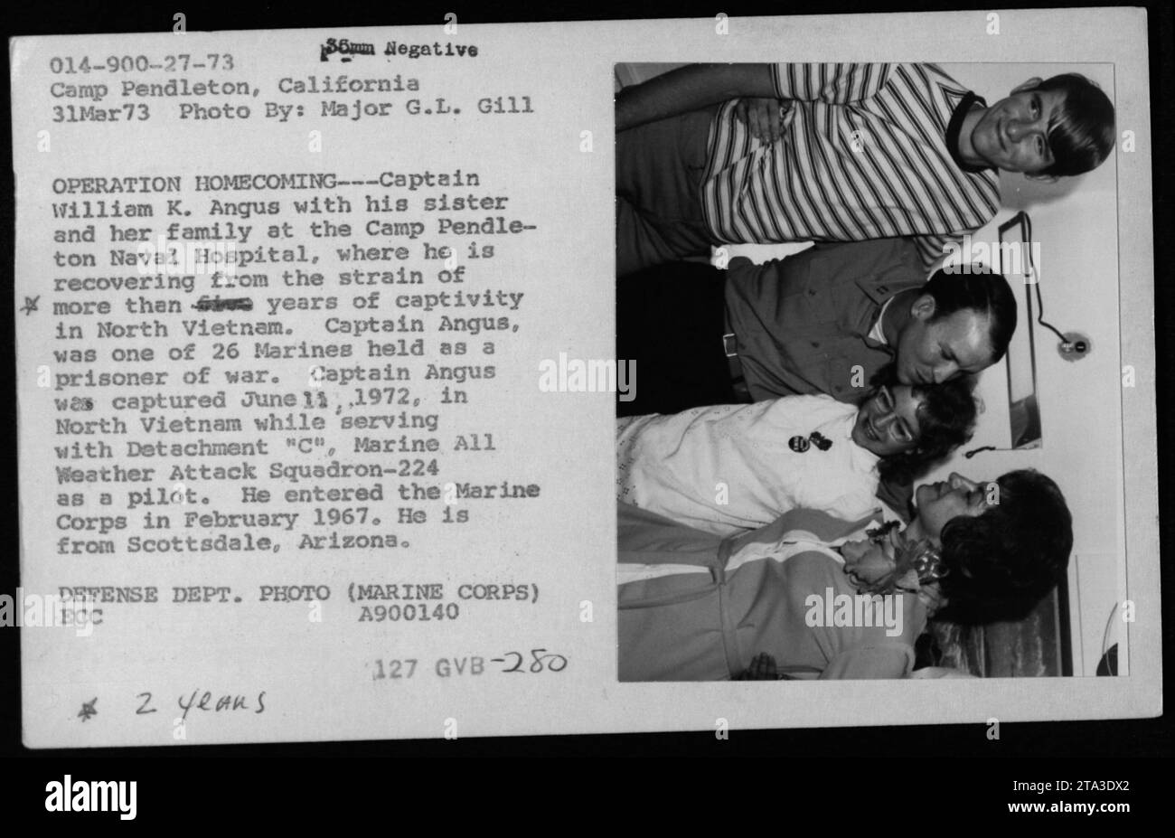 "Captain William K. Angus, a former prisoner of war, is pictured with ...