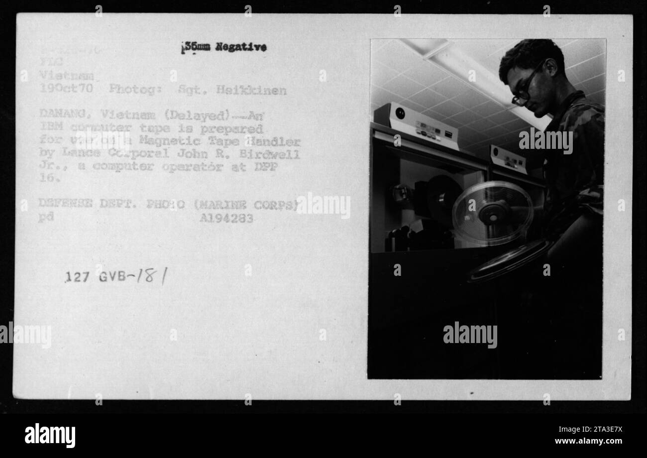 A computer operator, Lance Corpsman John R. Birdwell Jr., prepares an ...