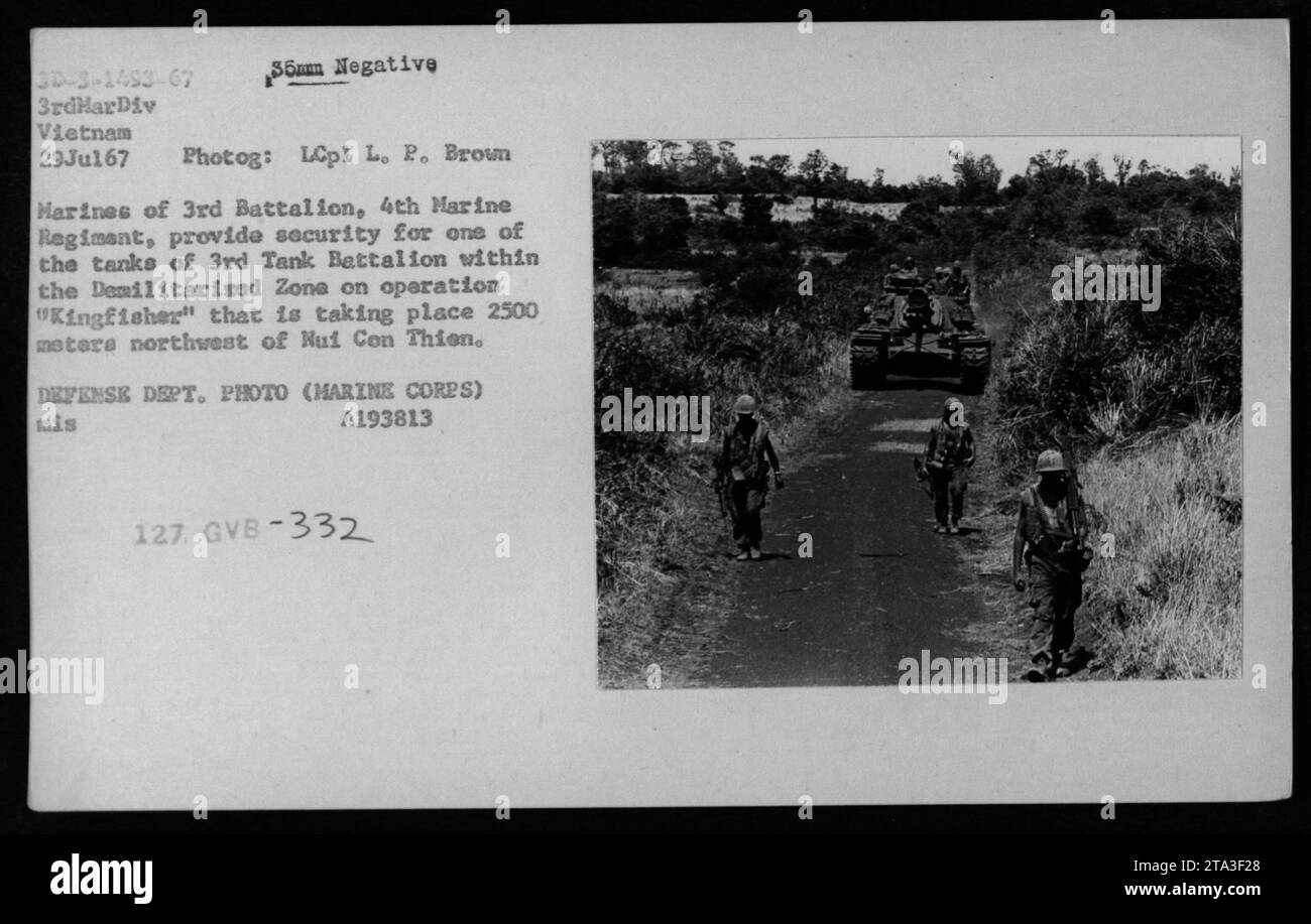 Marines from 3rd Battalion, 4th Marine Regiment provide security for a ...