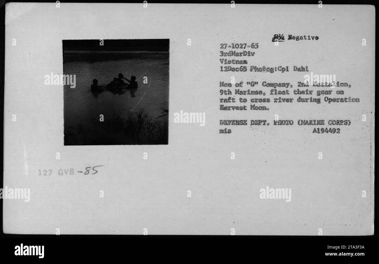 Marines from G Company, 2nd Battalion, 9th Marines cross a river on a ...