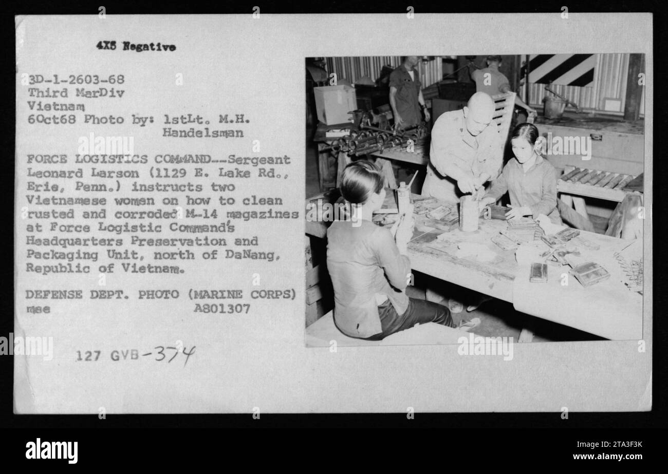 Sergeant Leonard Larson of Force Logistics Command instructs two ...