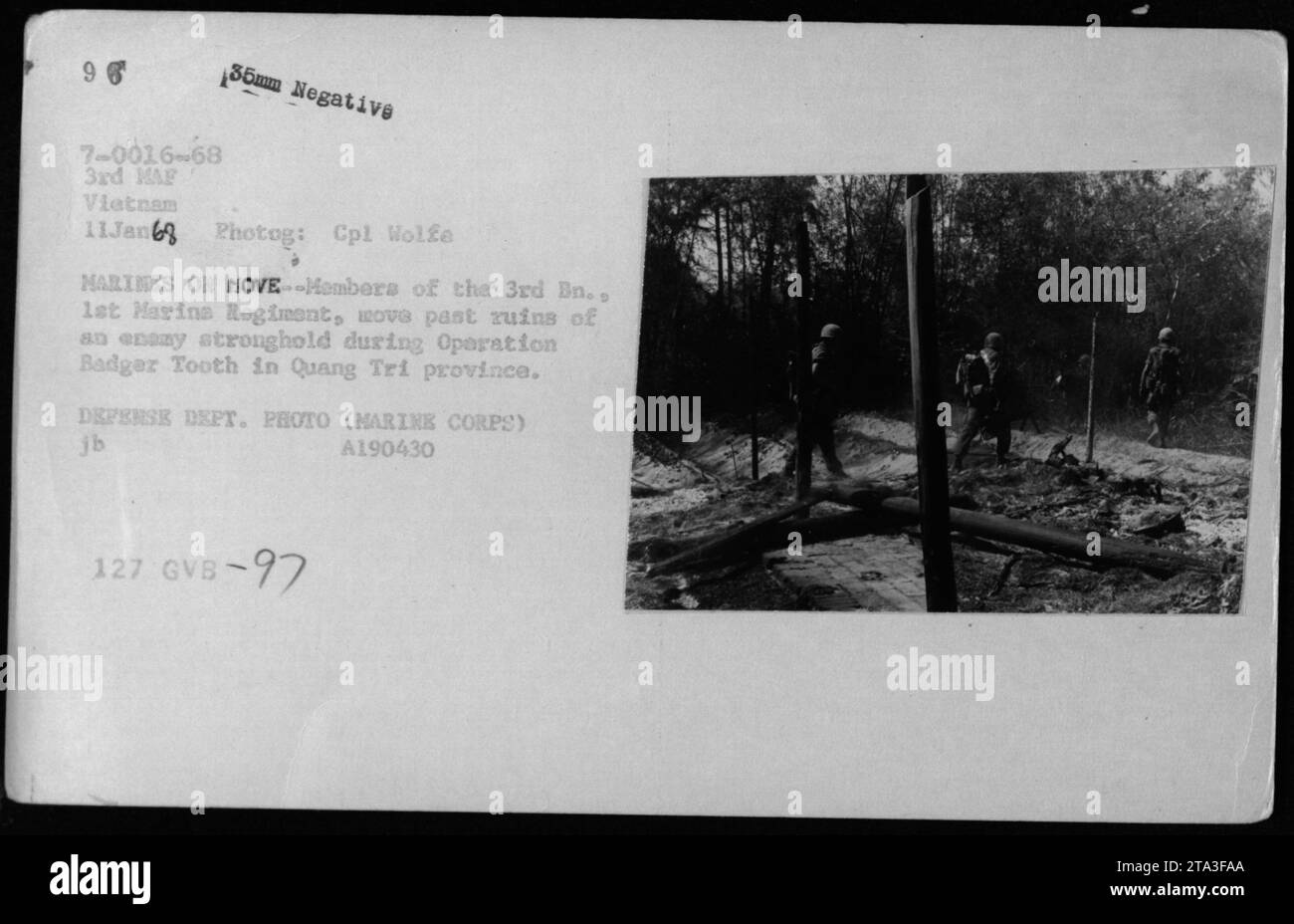 Marines from the 3rd Battalion, 1st Marine Regiment, traverse the ...