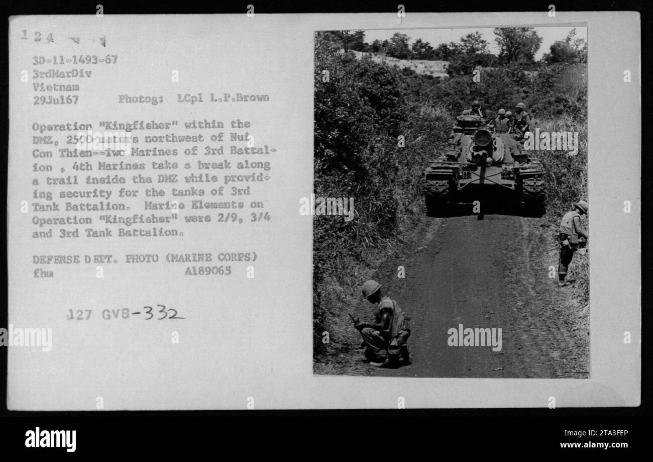 Marines from the 3rd Battal- fon, 4th Marines take a break while ...