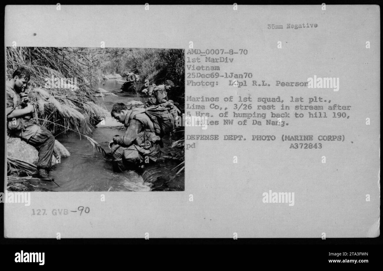 Marines from Lima Company, 1st squad, 1st platoon, 3/26 unit, take a ...