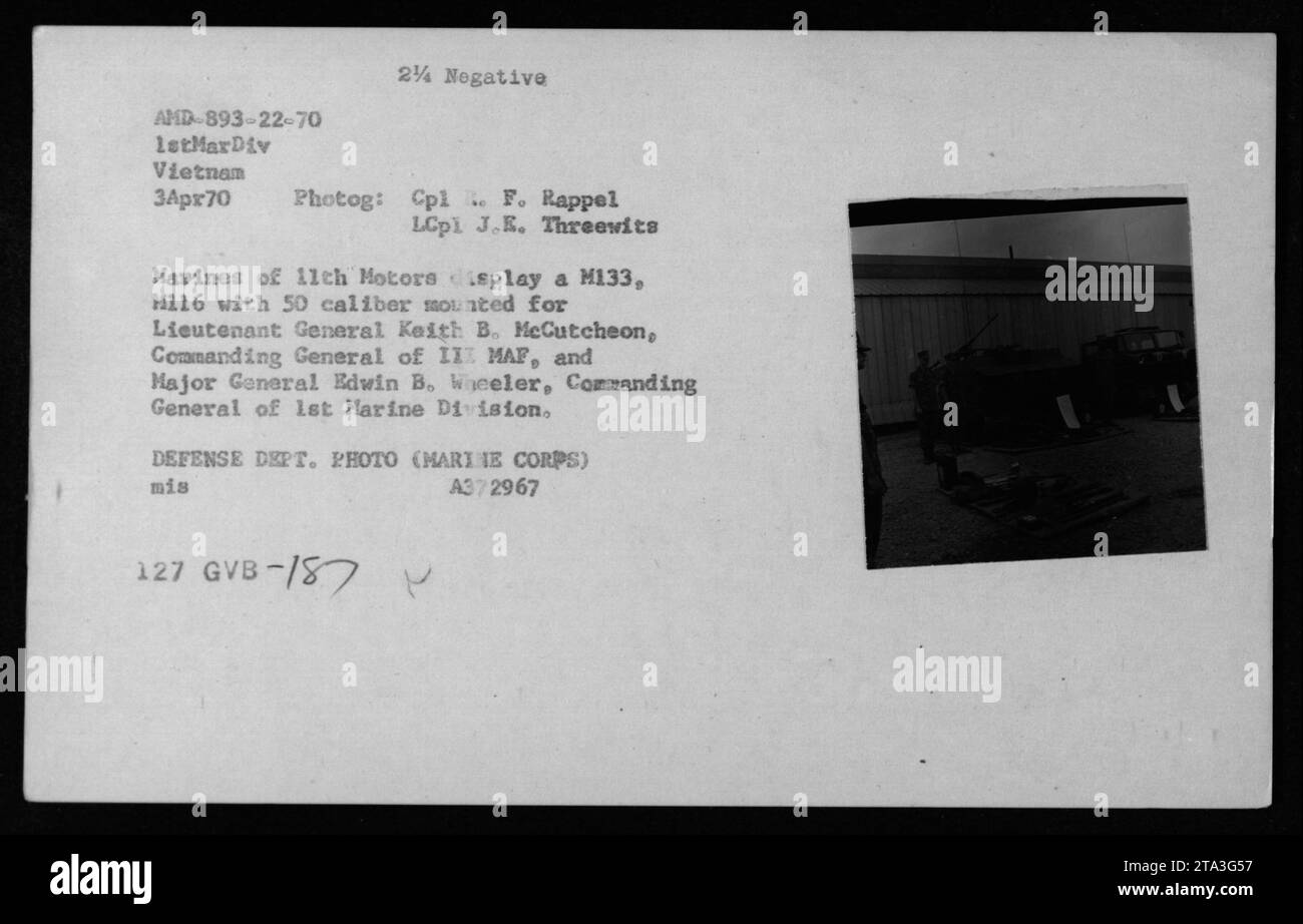 Marines from the 11th Motors unit in Vietnam display a M133 and M116 ...