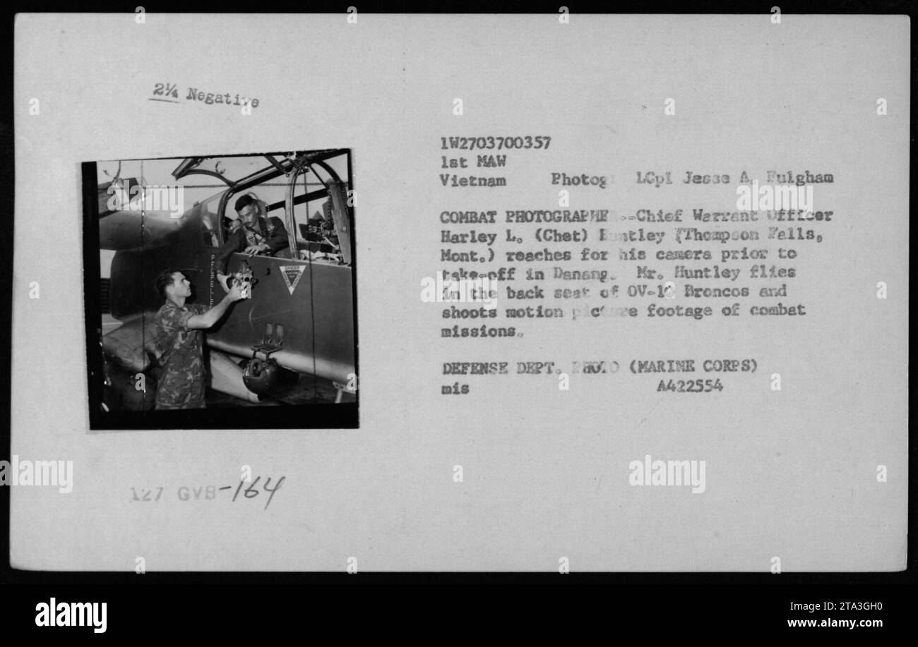 Chief Warrant Officer Harley L. Entley, a combat photographer from ...