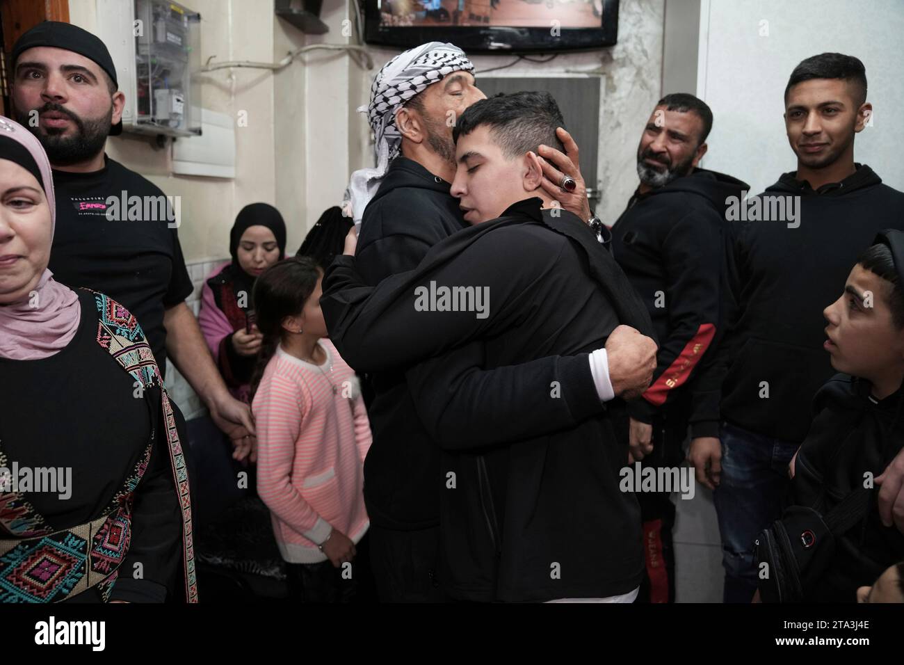 Ahmed Salaima, 14, center, a Palestinian prisoner released by Israel ...