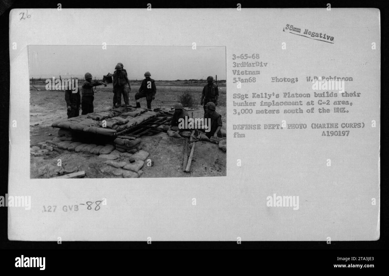 Sergeant Kelly's Platoon of the 3rd Marine Division constructs a bunker ...