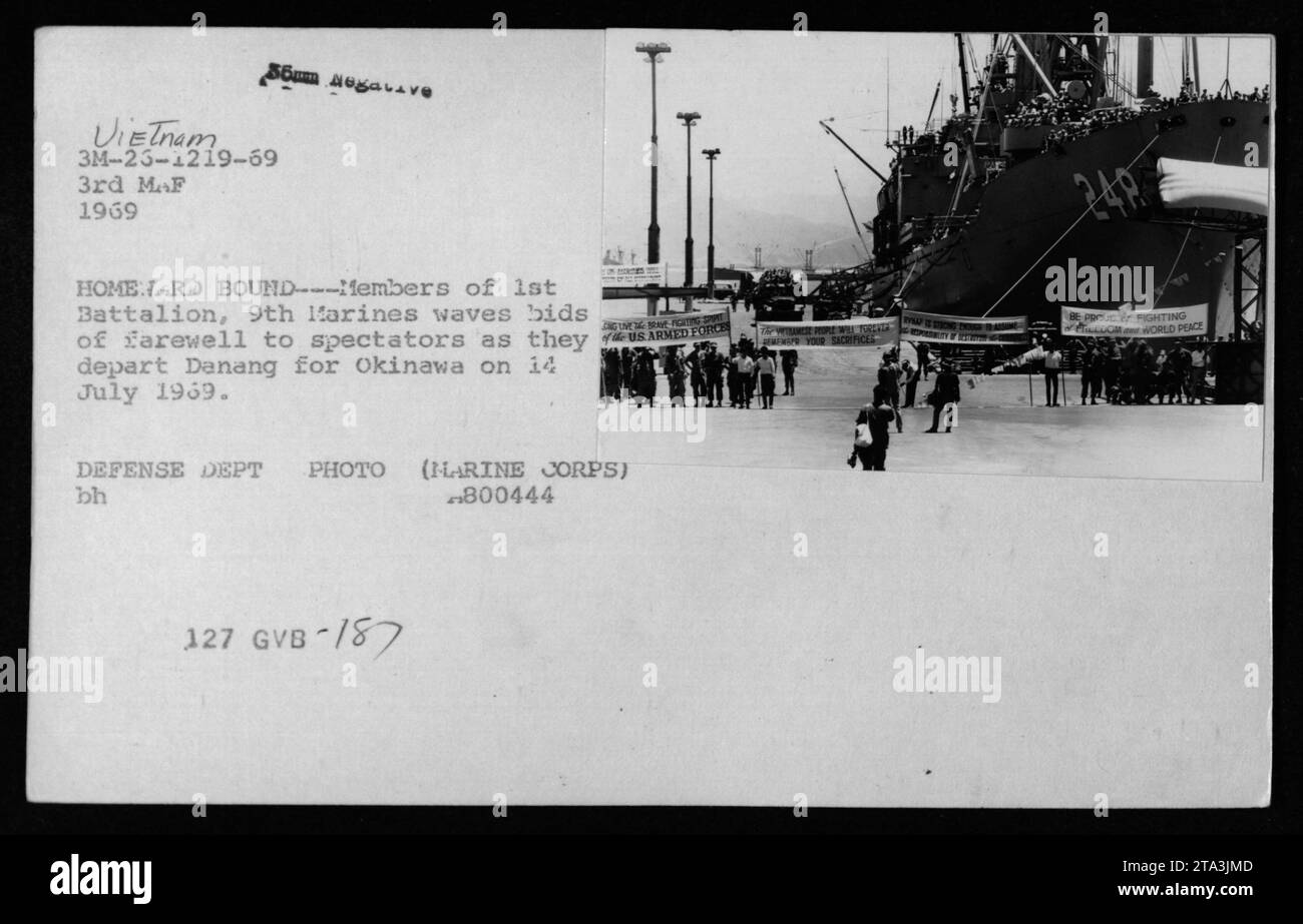 Members of 1st Battalion, 9th Marines, wave goodbye to spectators as ...