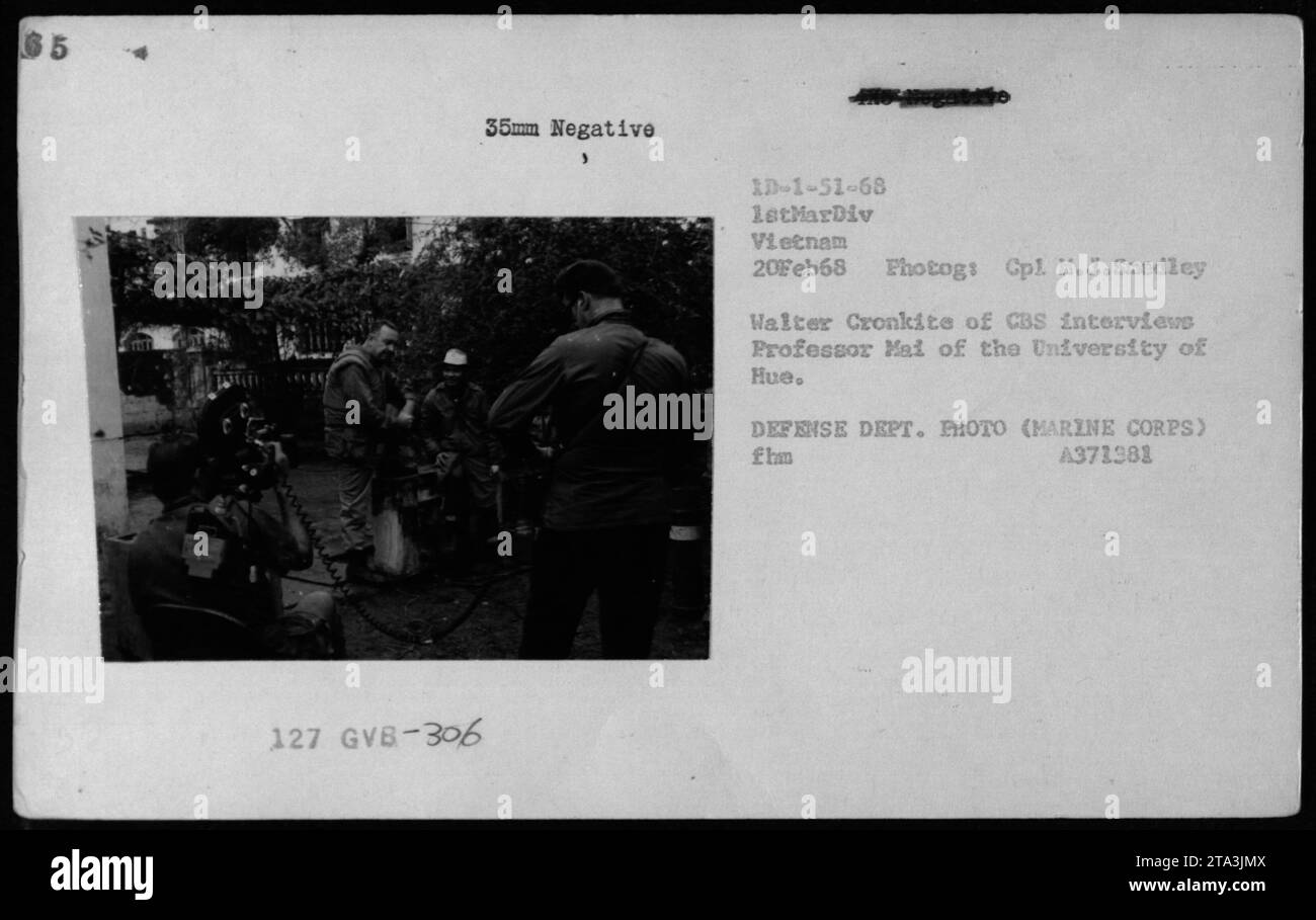 Walter Cronkite, a notable CBS reporter, is seen conducting an ...