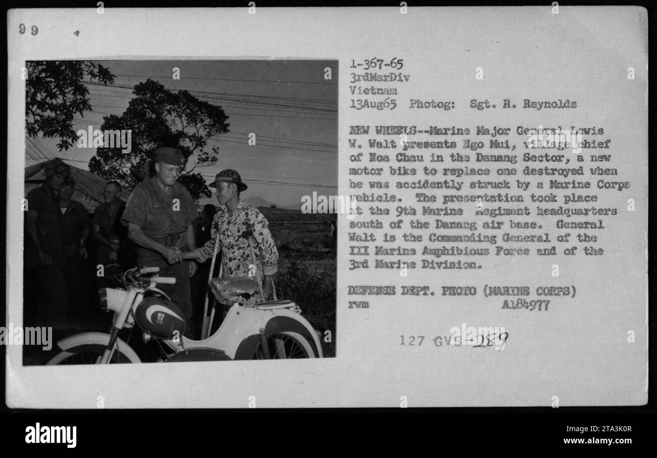 Marine Major General Lewis W. Walt presents a new motorbike to Mgo Mui ...