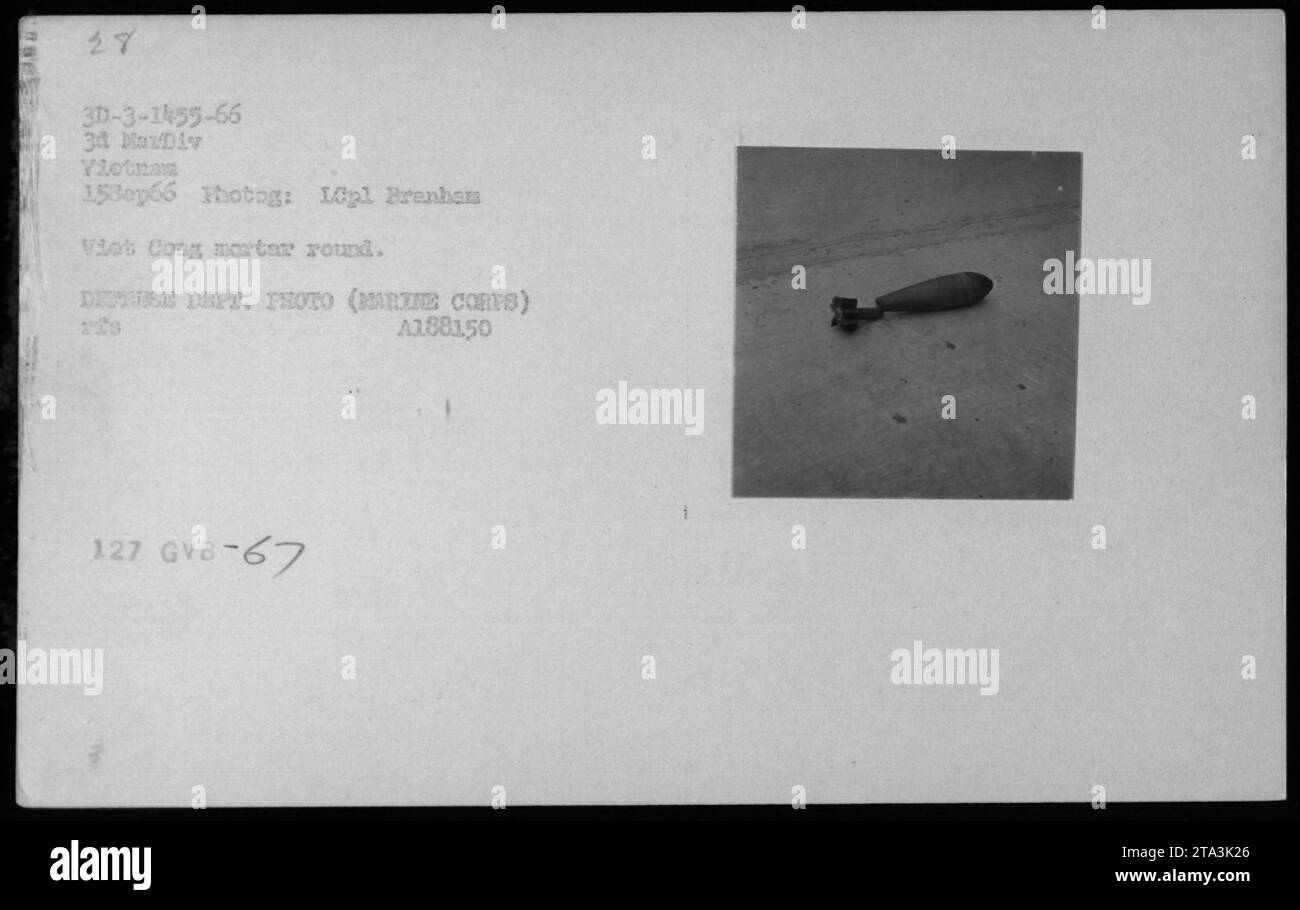 "Soldiers examining a captured Viet Cong mortar round on September 15 ...