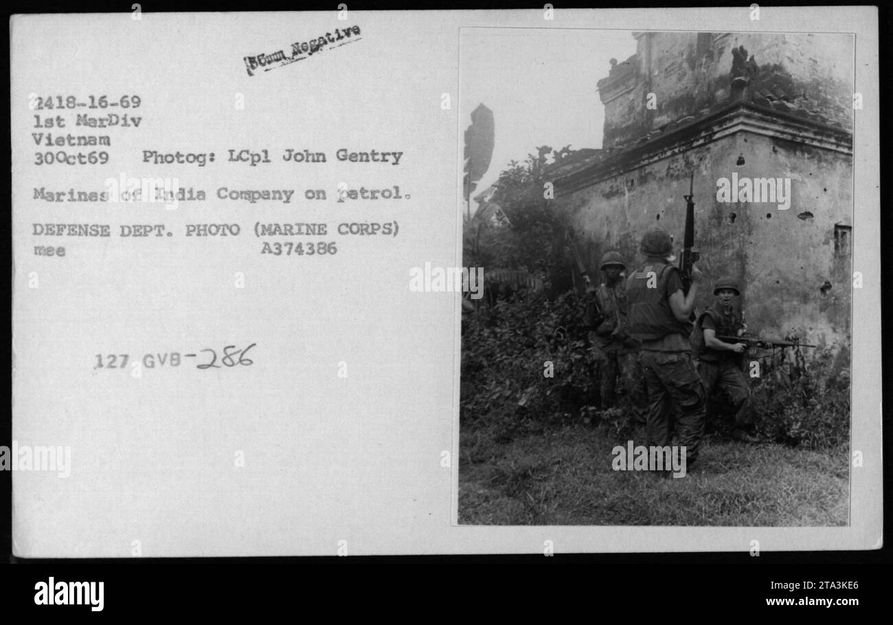 Marines of India Company, 1st Marine Division, conduct a patrol mission ...