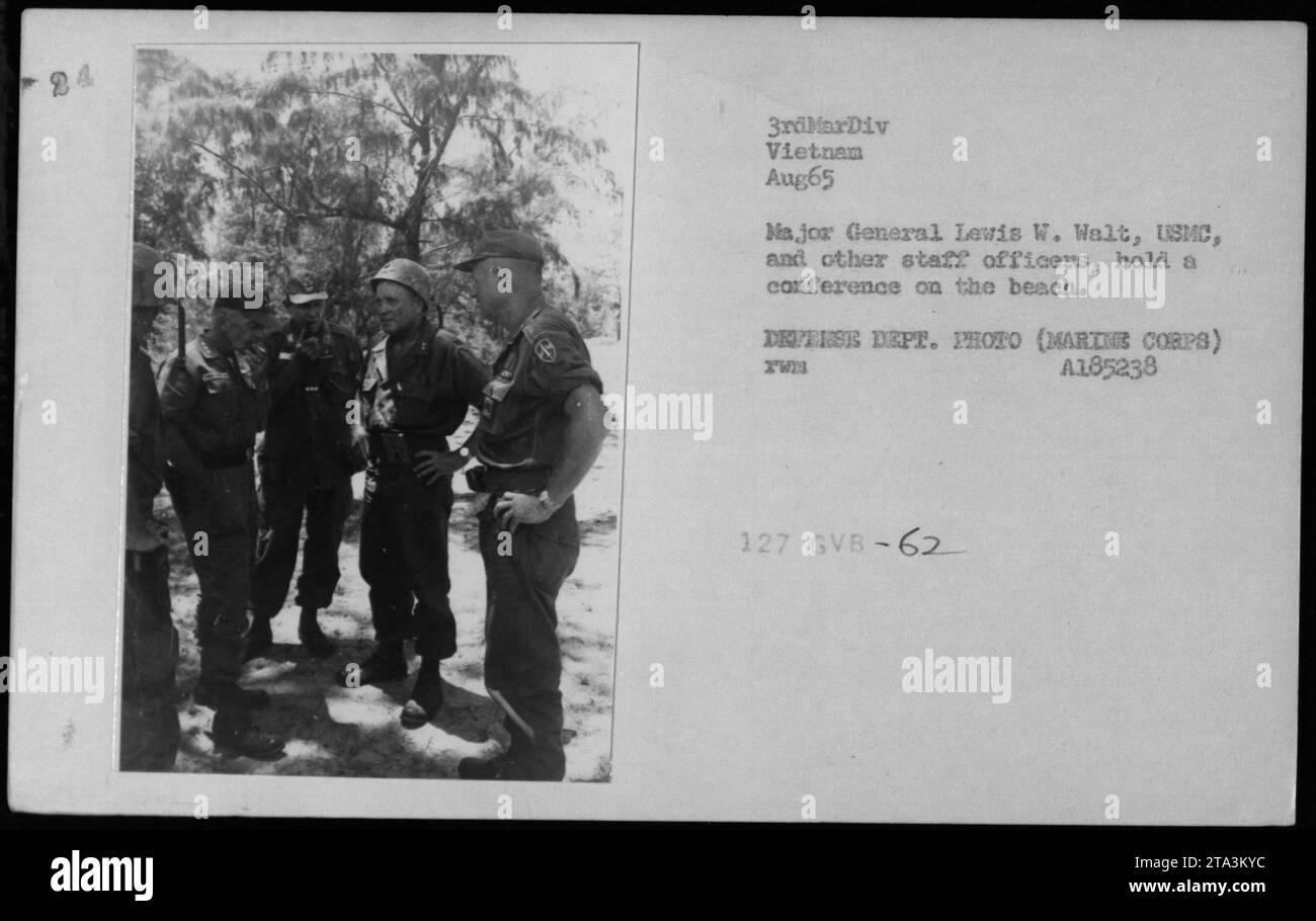 Major General Lewis W. Walt and staff officers hold a briefing ...