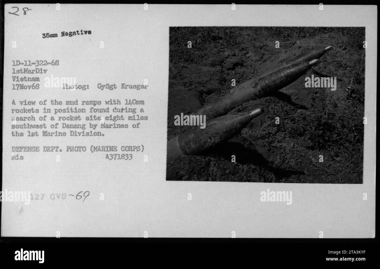 Marines of the 1st Marine Division search a rocket site located eight ...