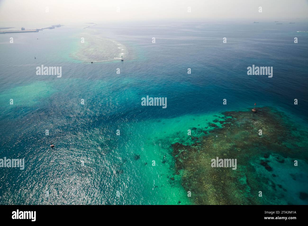 Persian Gulf aerial view, Saudi Arabia. Red beacon tower stands in ...