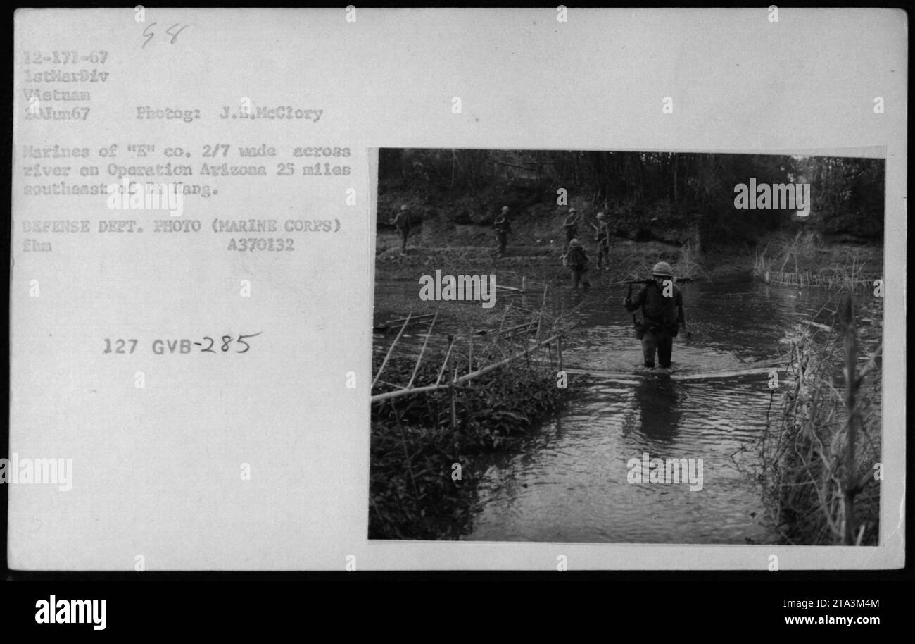 On June 20, 1967, Marines from G Company, 2/7, perform a river crossing ...
