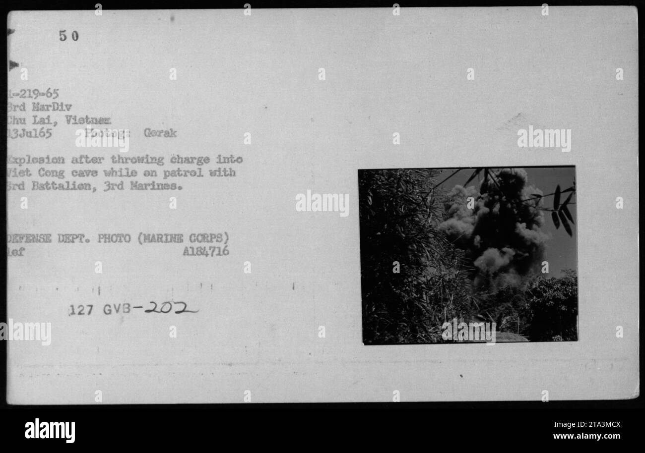 Explosion after Marines throw charges into a Viet Cong cave during a ...