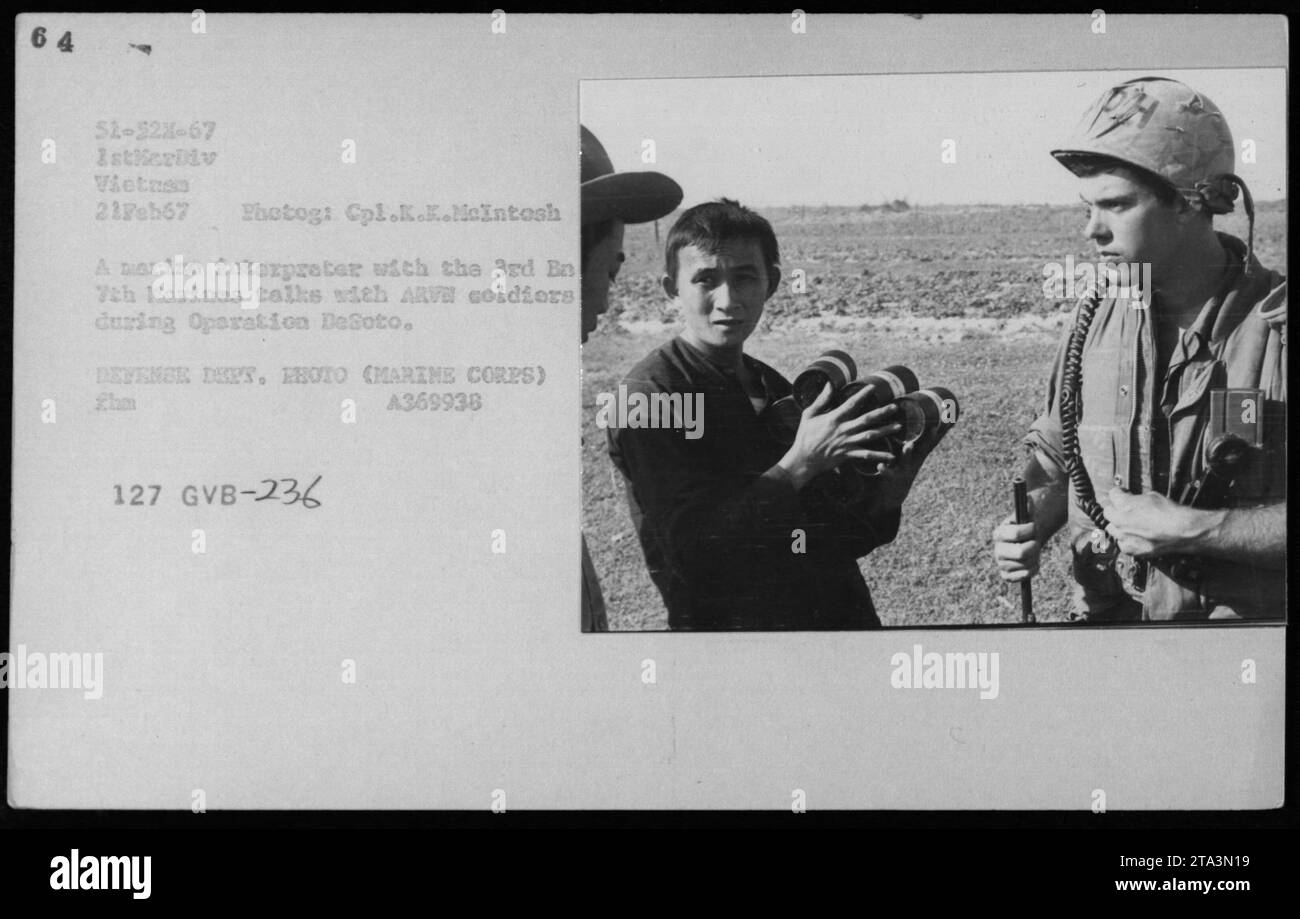 A Marine Corps interpreter communicates with ARVN soldiers during ...