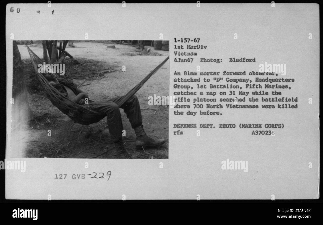 An 81mm mortar forward observer takes a nap while a rifle platoon ...