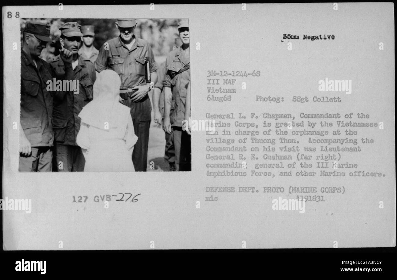 Gen Leonard F. Chapman, Commandant of the Marine Corps, is greeted by ...