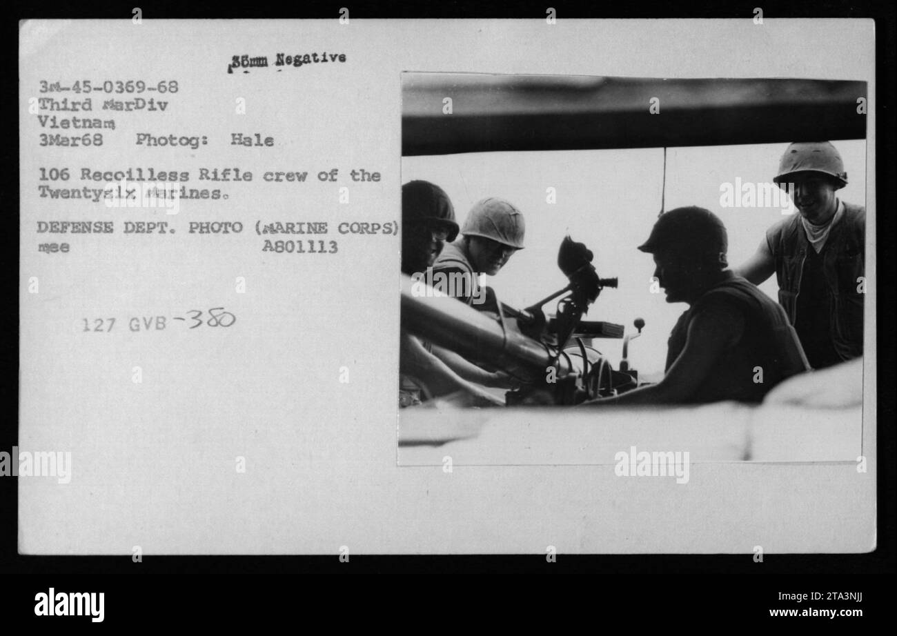 A photograph of a 106-mm recoilless rifle crew from the Third Marine ...