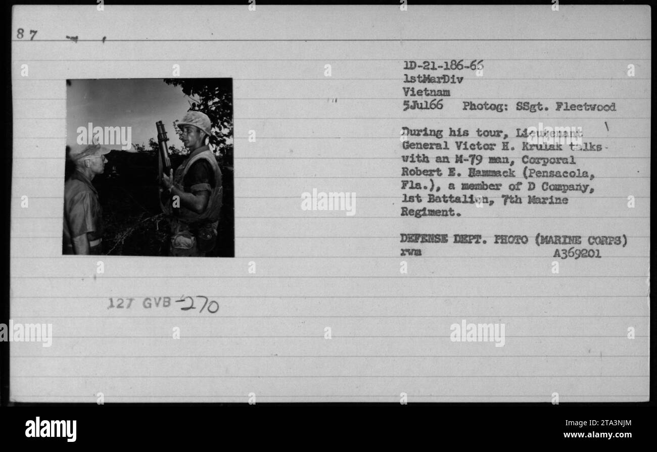 Lieutenant General Victor H. Krulak engages in conversation with ...