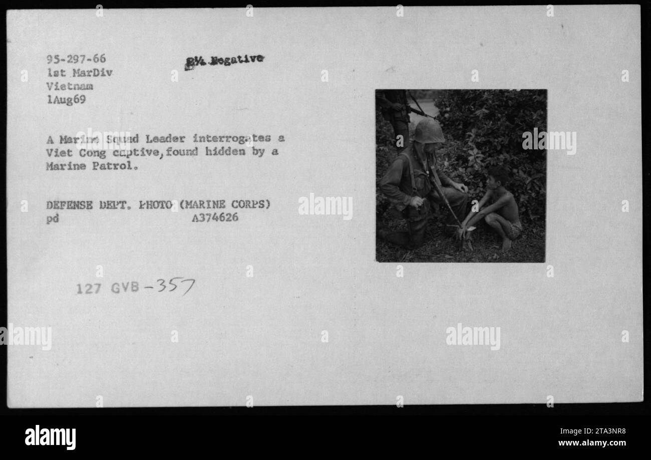 A Marine Squad Leader interrogates a captured Viet Cong suspect found ...