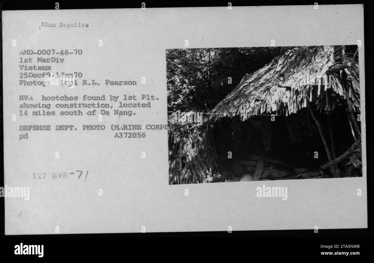 Destroyed NVA huts discovered by the 1st Platoon, showcasing their ...
