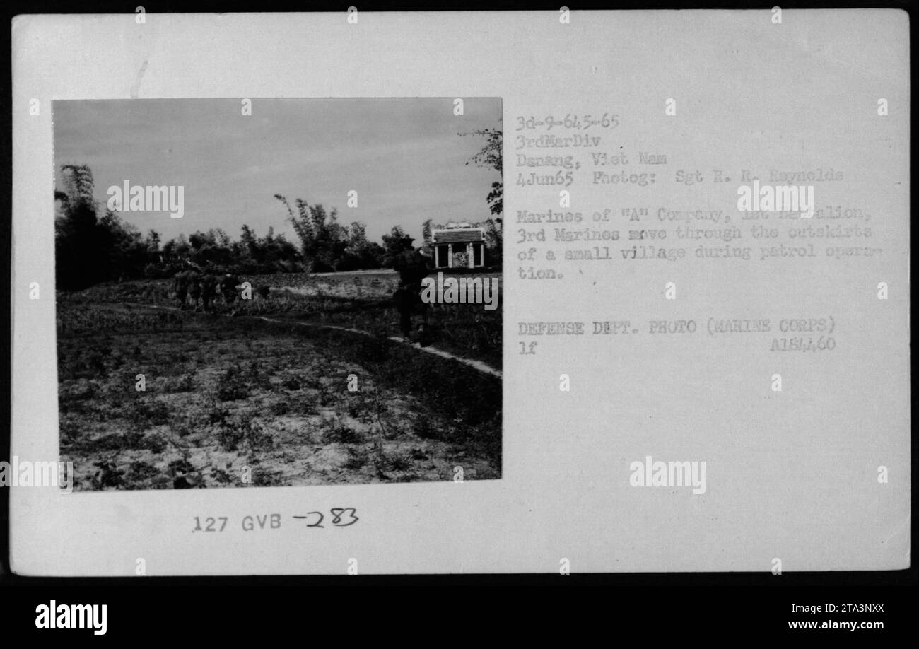 Marines from "A" Company, 3rd Battalion, 3rd Marines patrol through the ...