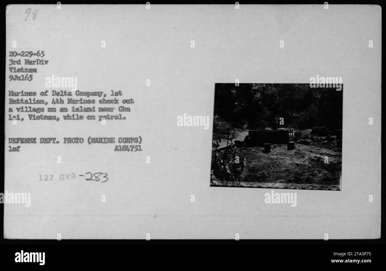 Marines from Delta Company, 1st Battalion, 4th Marines, patrol an ...