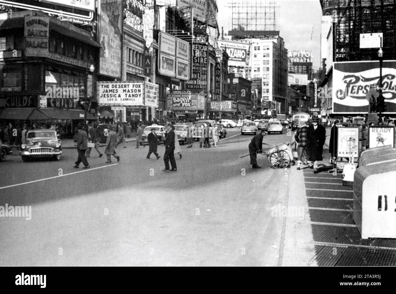 New York street scene in autumn 1951 with Movie Theatres showing JAMES ...