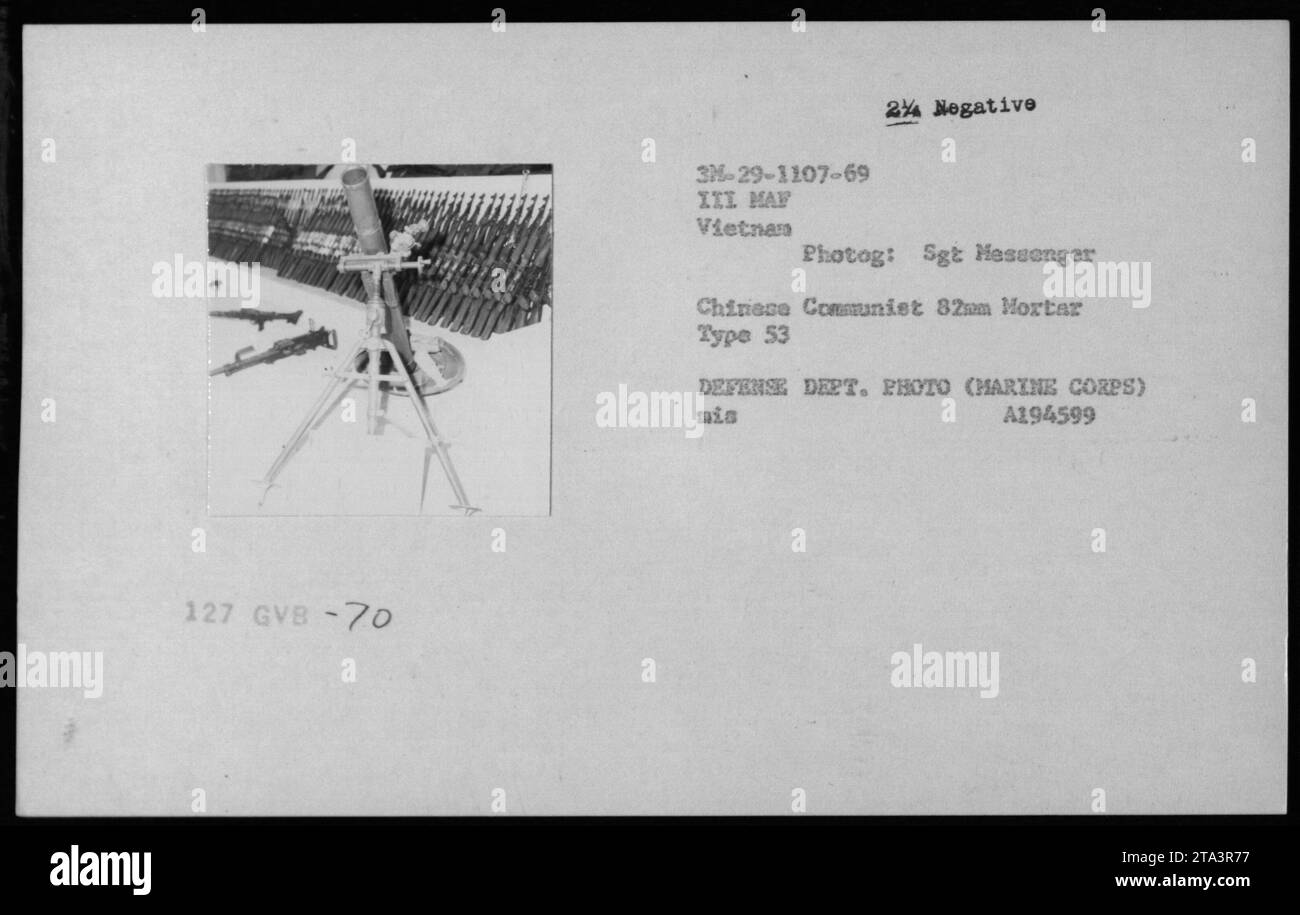 Captured Chinese Communist weapons including a Type 53 82mm mortar are ...