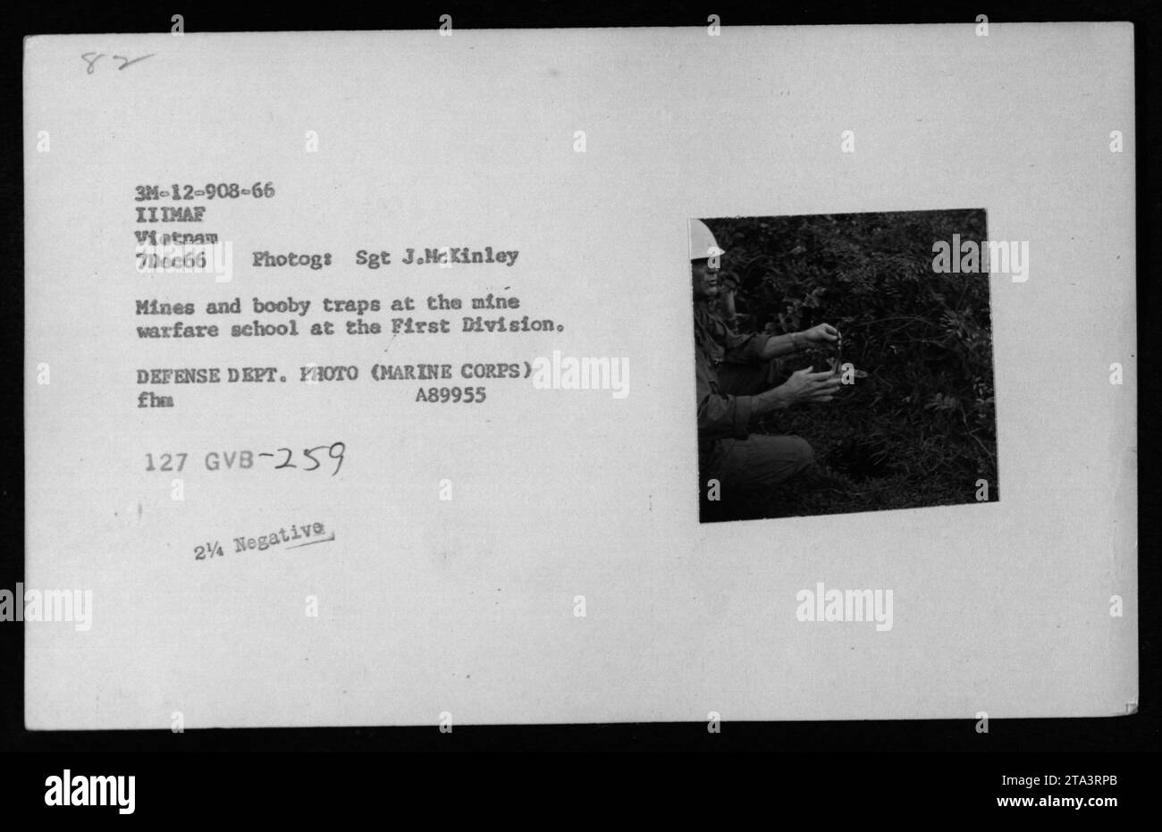 Soldiers at the Mine Warfare School are seen examining and studying ...