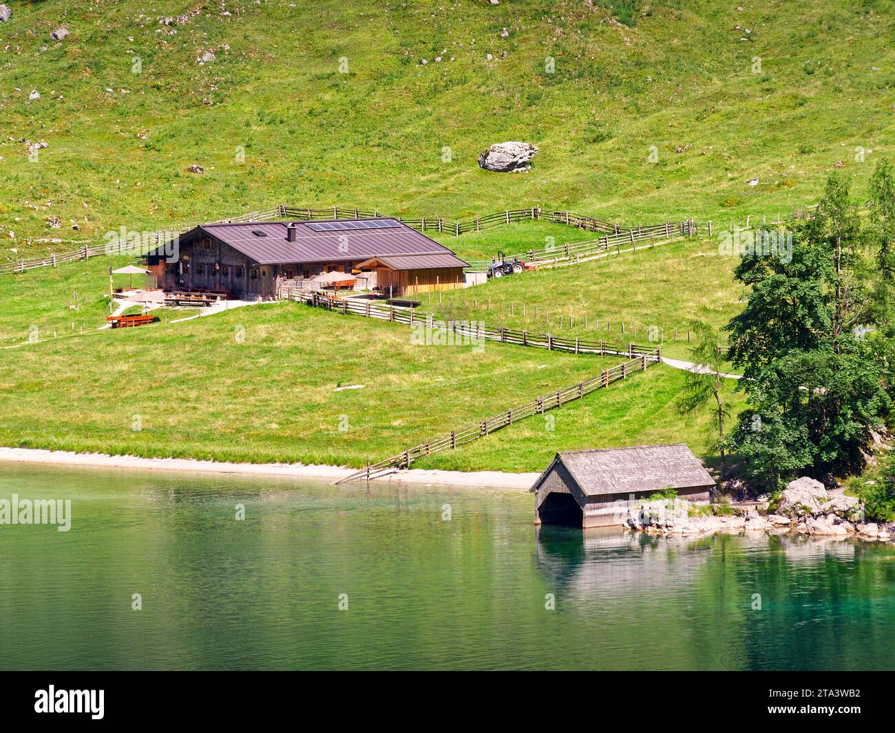 Organic farm house near lakeshore in summer Stock Photo - Alamy