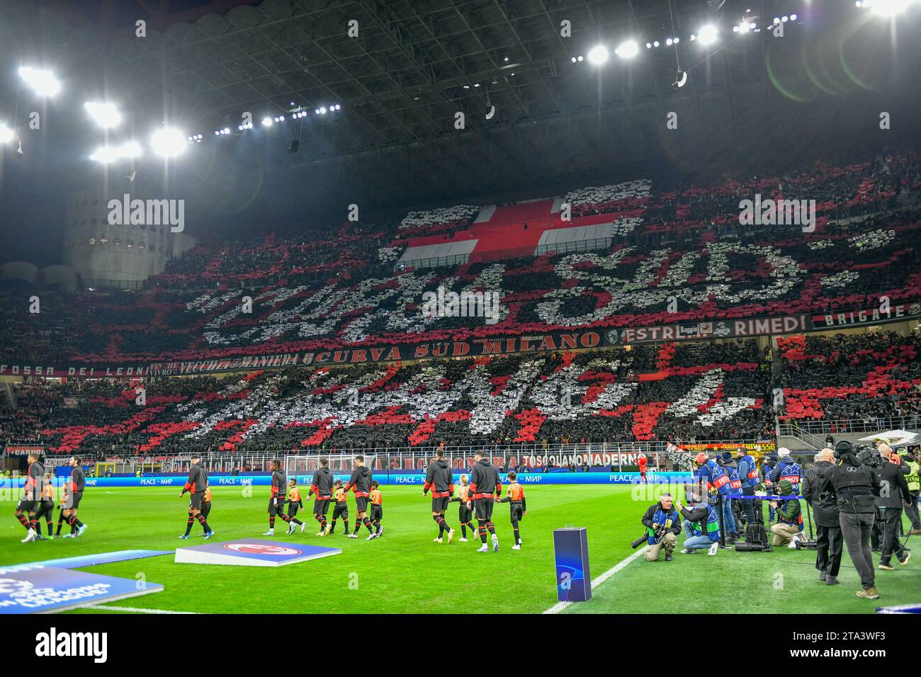 Milano, Italy. 28th Nov, 2023. The players of AC Milan enter the pitch to a huge tifo from the ...